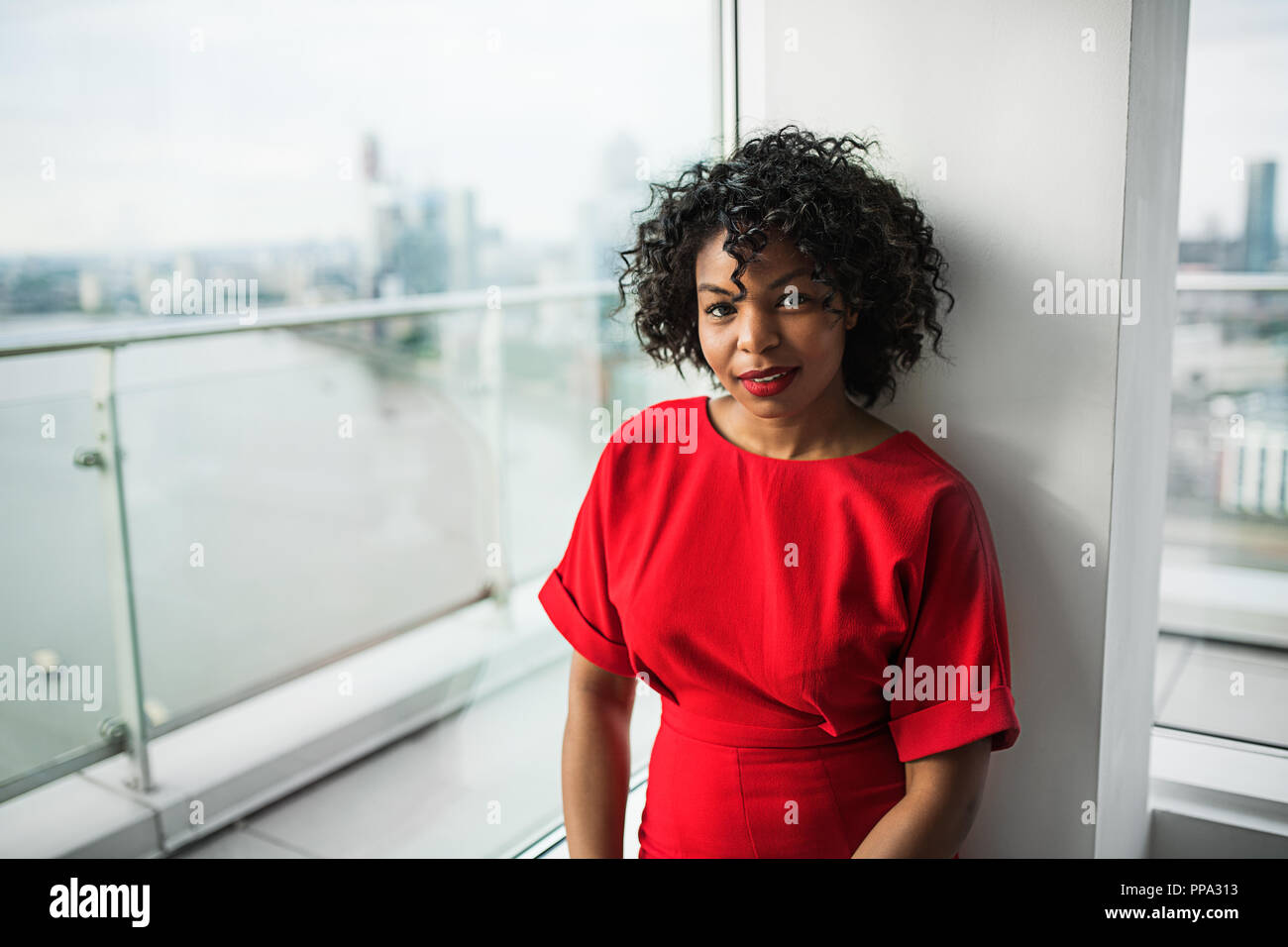 Businesswoman standing up against hi-res stock photography and images ...