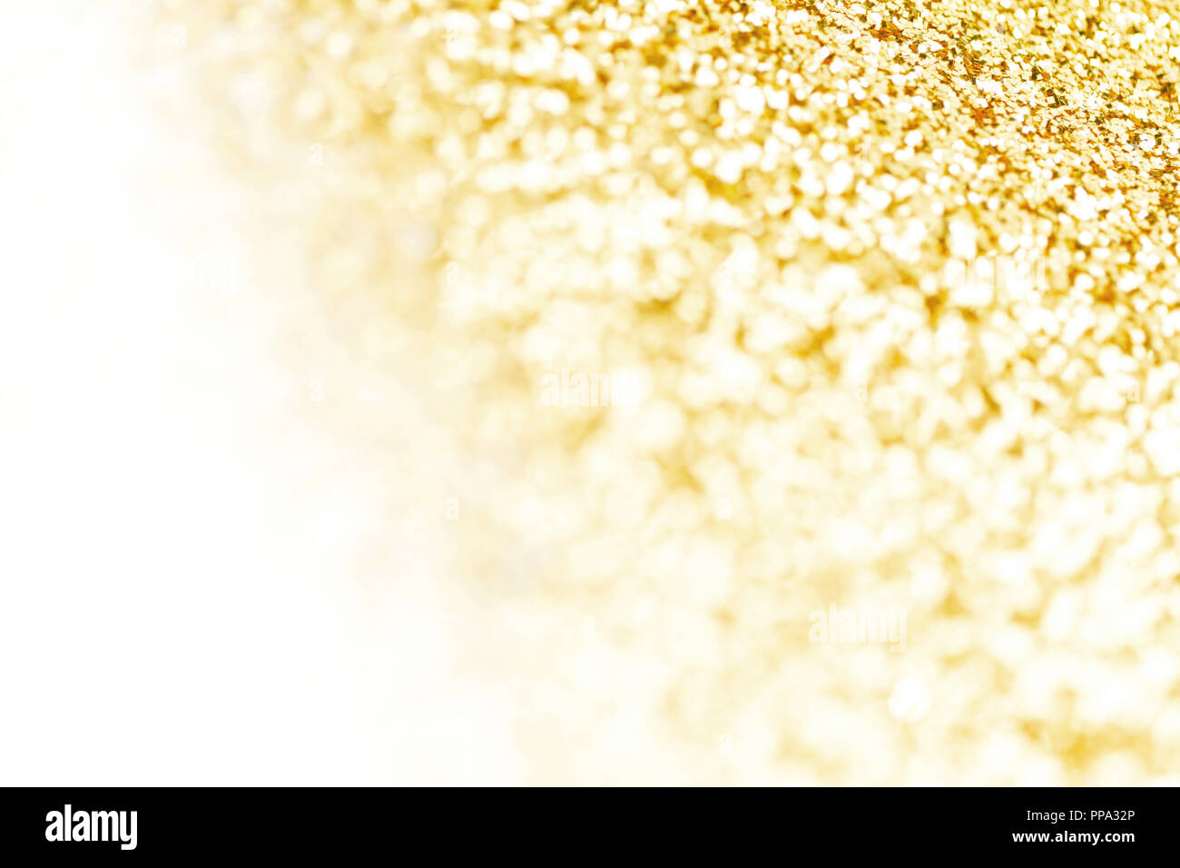 Shiny abstract golden defocused glitter background Stock Photo - Alamy