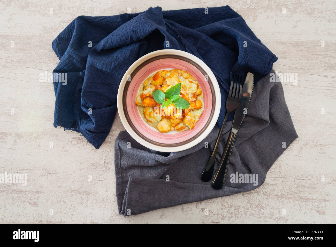 Dish made with cooked duck meat, dehydrated potato, fresh cream of ...