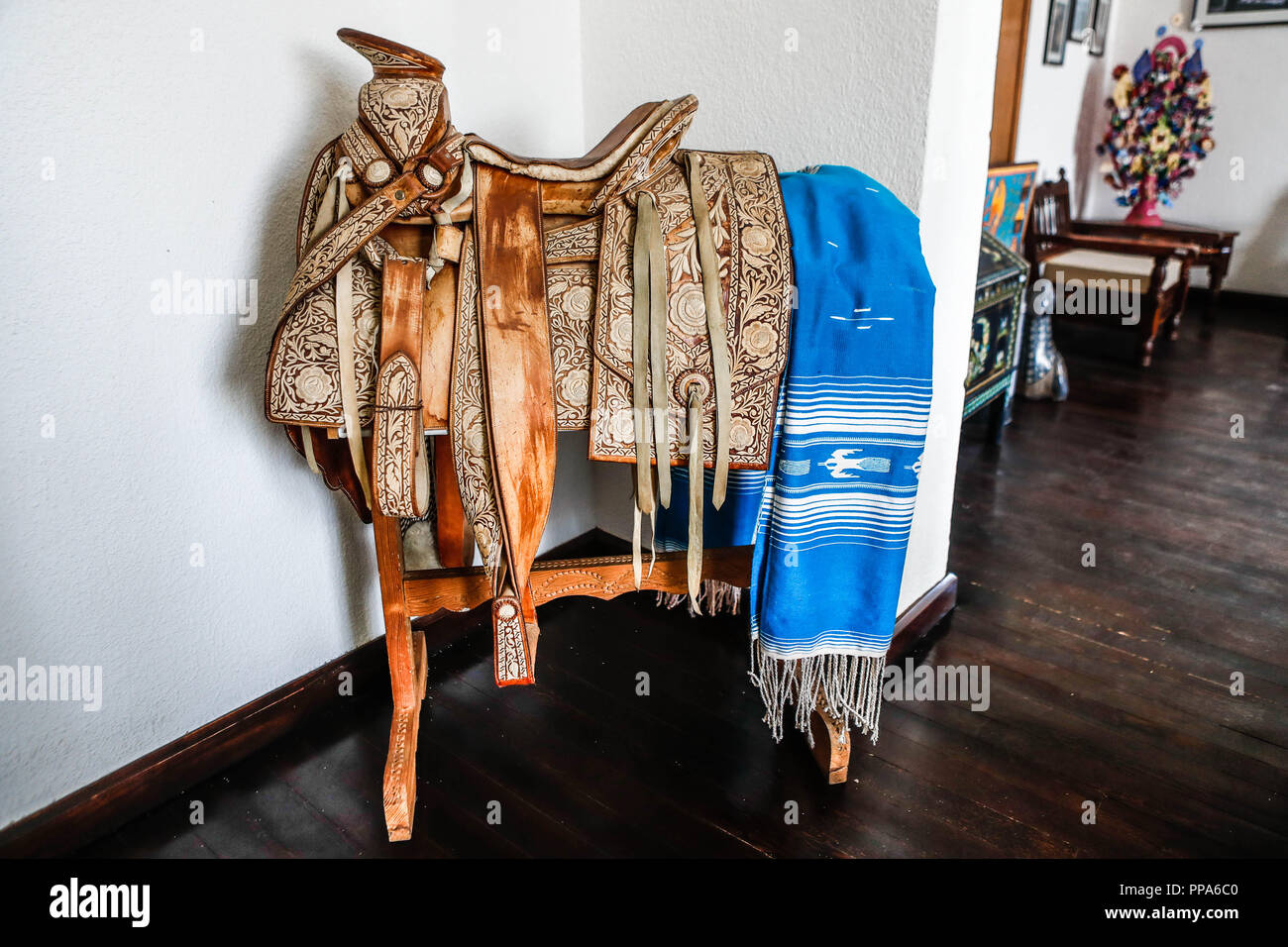 Zarape of blue color and Saddle. Decoration of the interiors of the ...