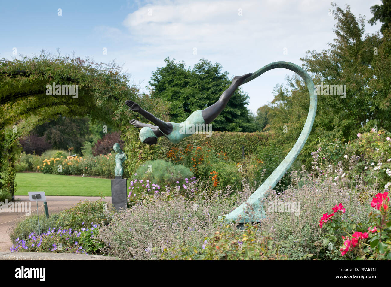 Diva statue next to the water fountain in the cottage garden at RHS ...