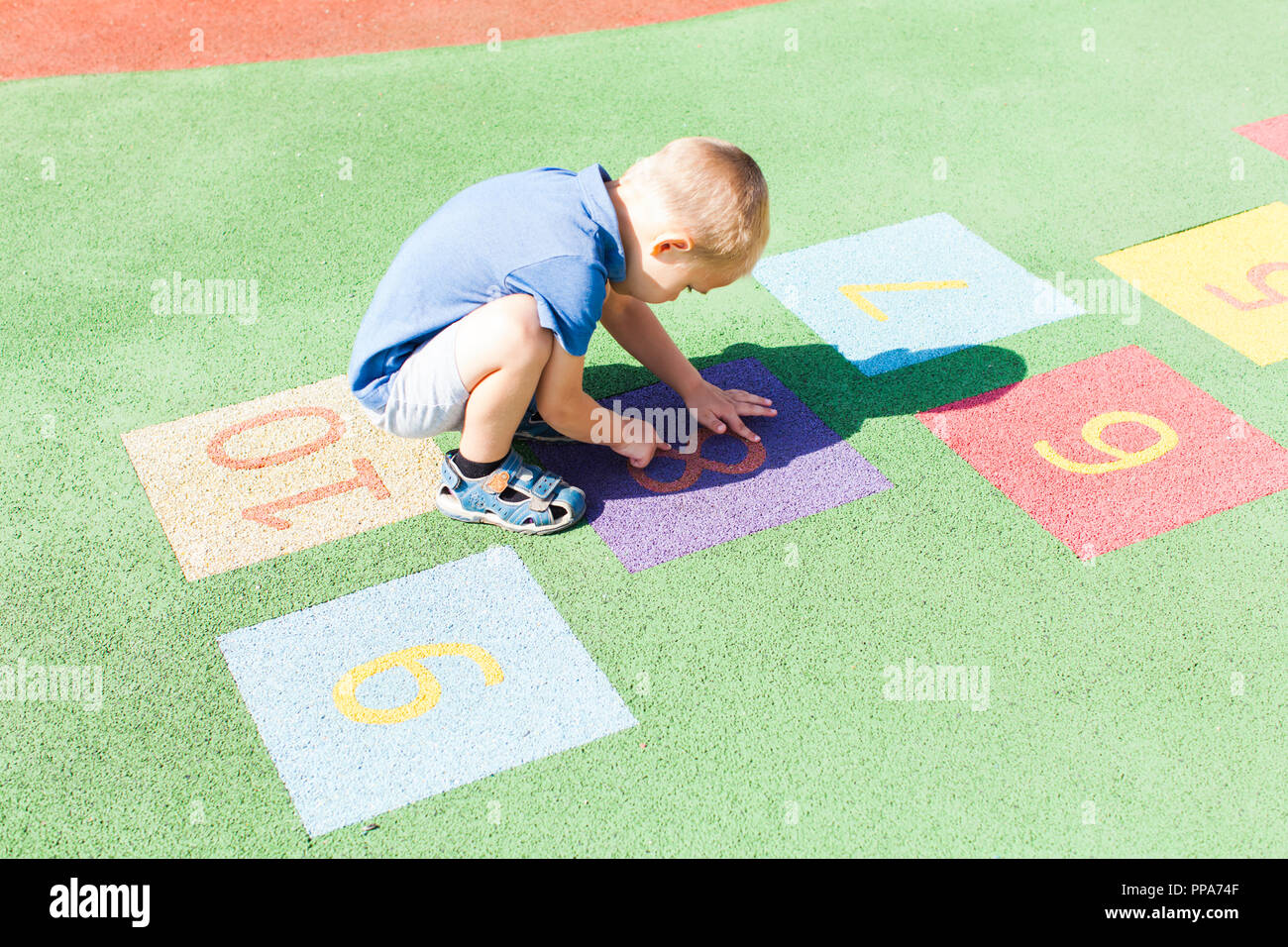 Child playing alone autism hi-res stock photography and images - Alamy