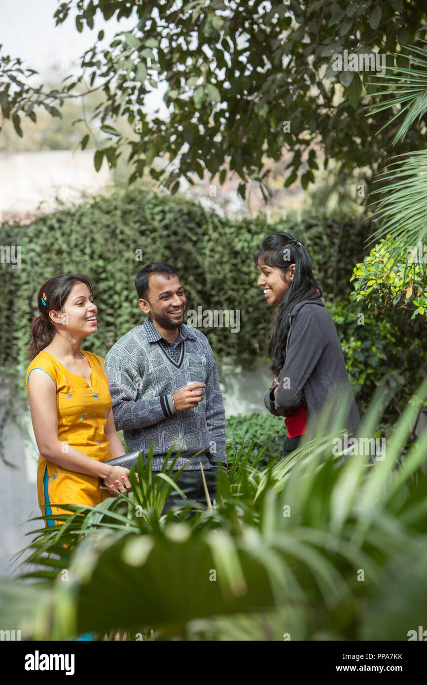 Indian Young professionals chatting Stock Photo - Alamy