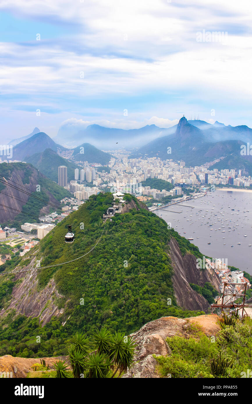 Sweeping View of buildings in the city of Rio de Janeiro with Favelas ...