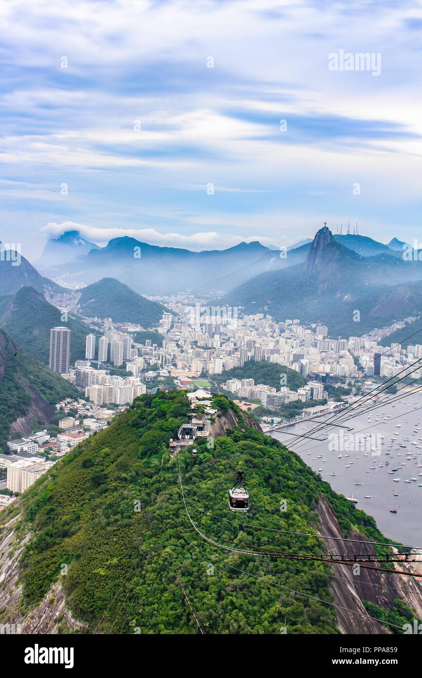 Sweeping View of buildings in the city of Rio de Janeiro with Favelas ...