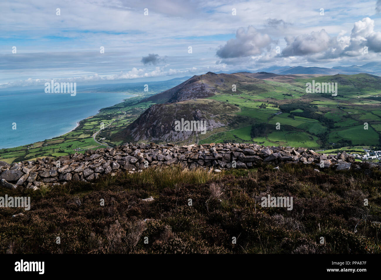 Tre`r Ceiri Hillfort and Yr Eifl showing stone huts, North Wales, UK ...