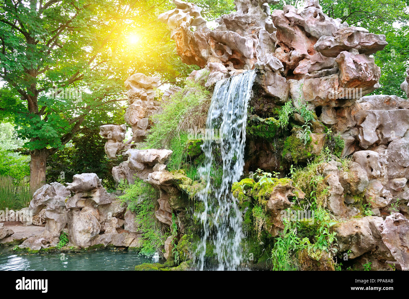 small waterfall in beautiful park Stock Photo - Alamy