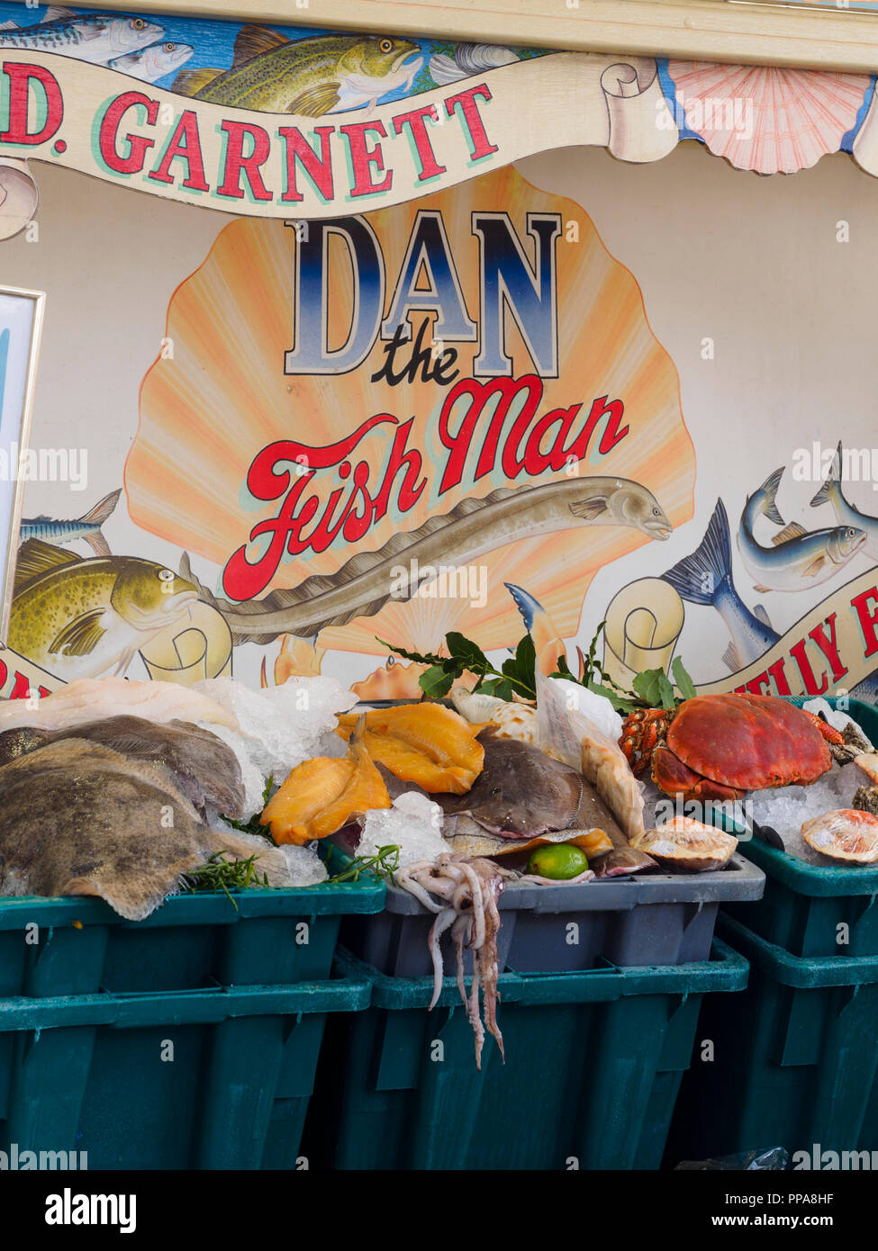 Fresh fish and seafood on display at a colourful stall during Plymouth ...