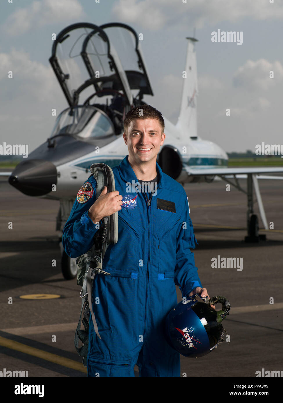 NASA astronaut candidate Matthew Dominick in front of a T-38 trainer ...