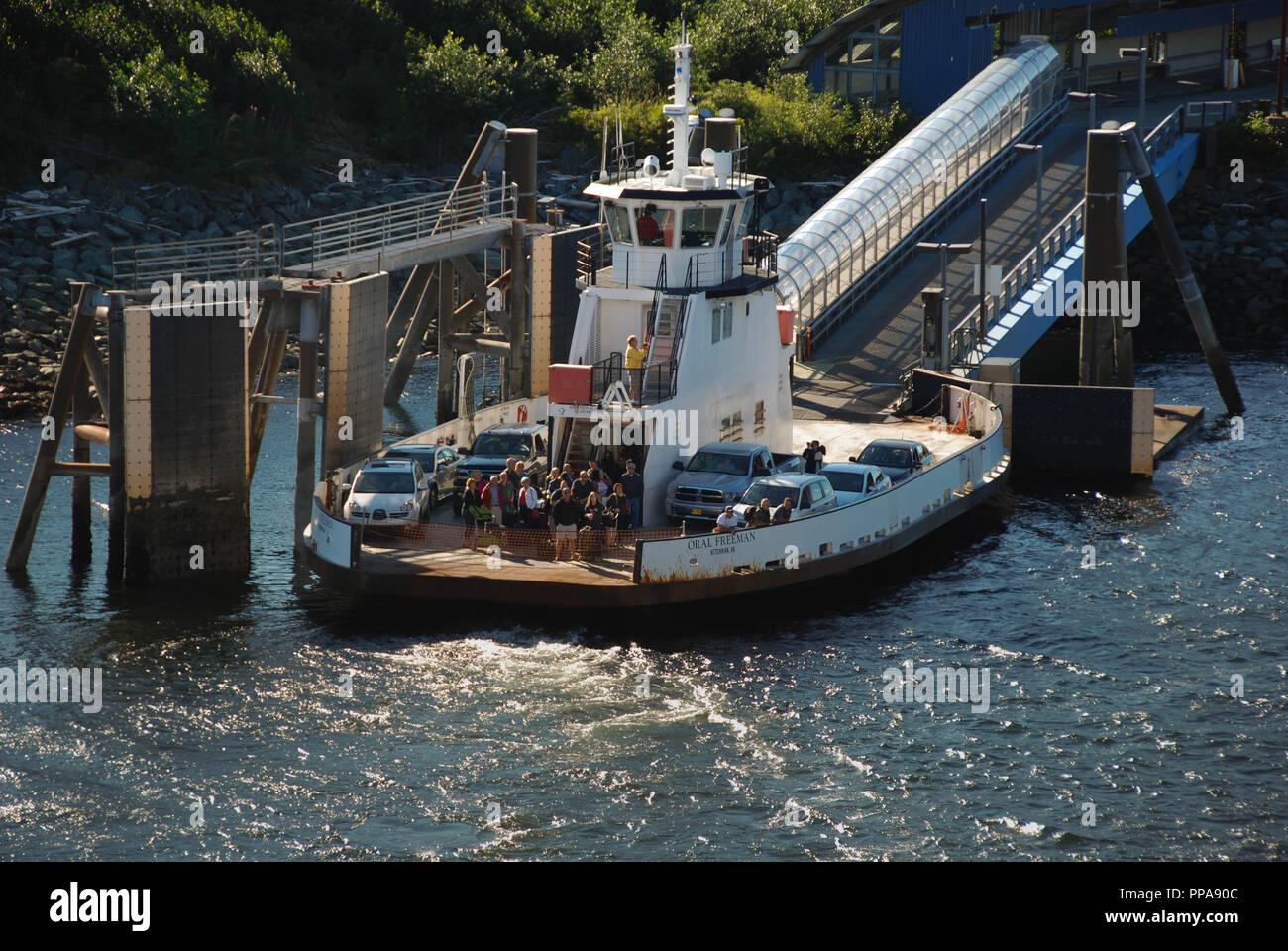 Small ferry which transports passengers and cars across the small ...