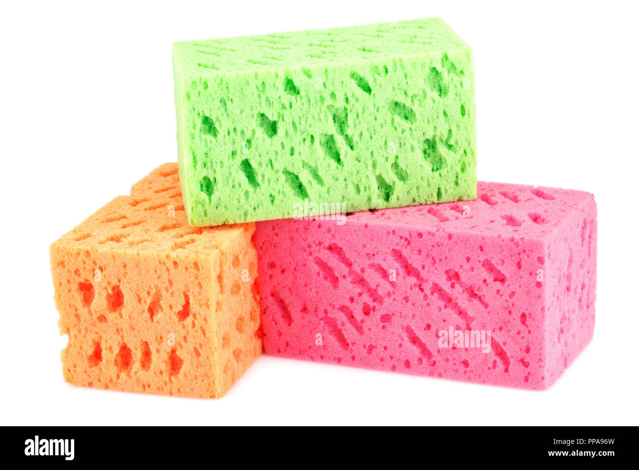 Colorful sponges isolated on white background Stock Photo - Alamy