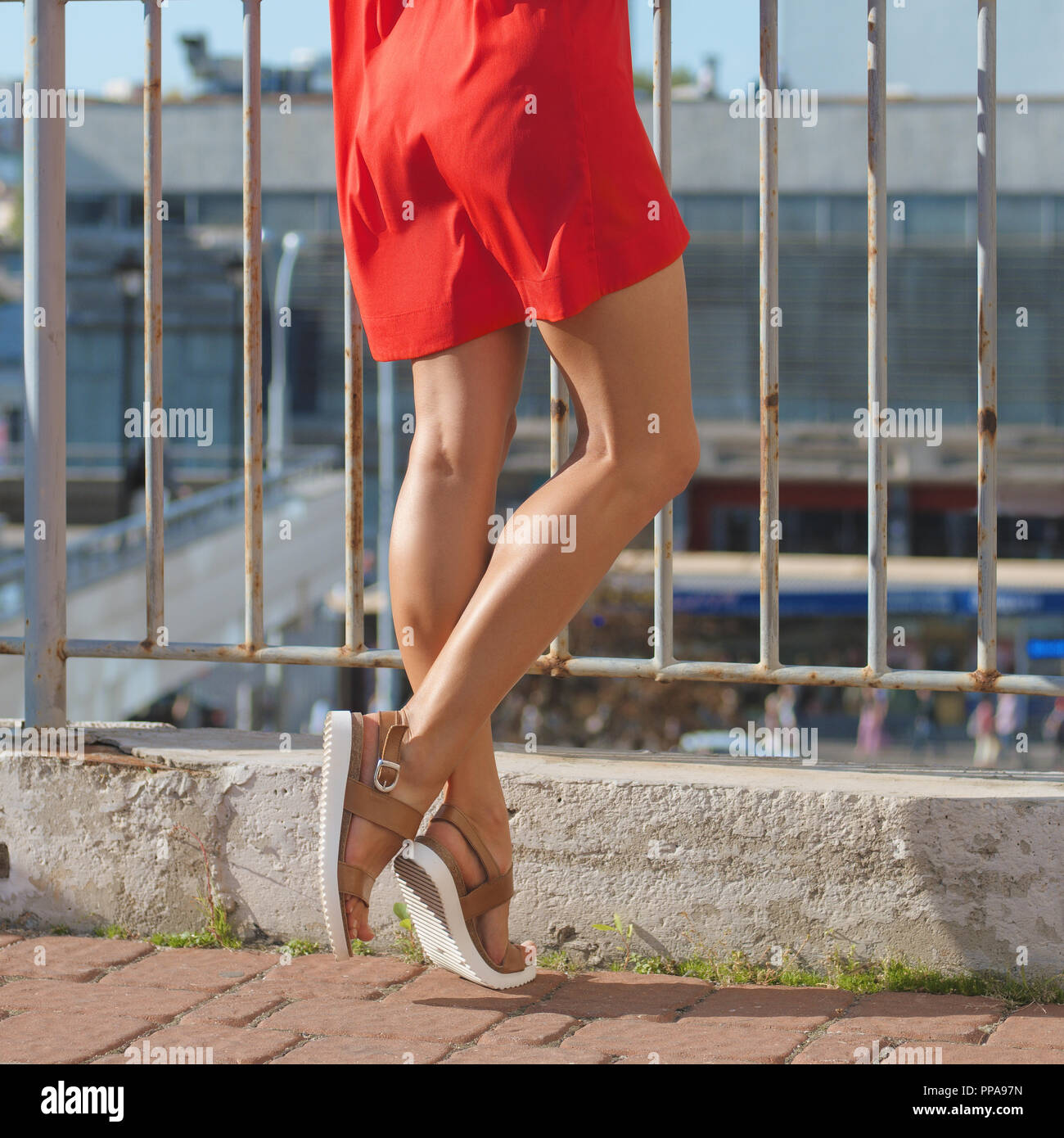 Muscular female legs posing outdoor Stock Photo - Alamy