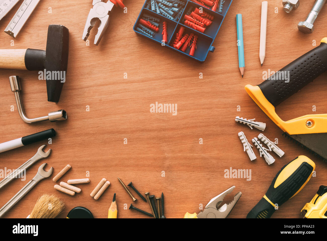 Handyman maintenance and repair project tools on workshop desk, top ...