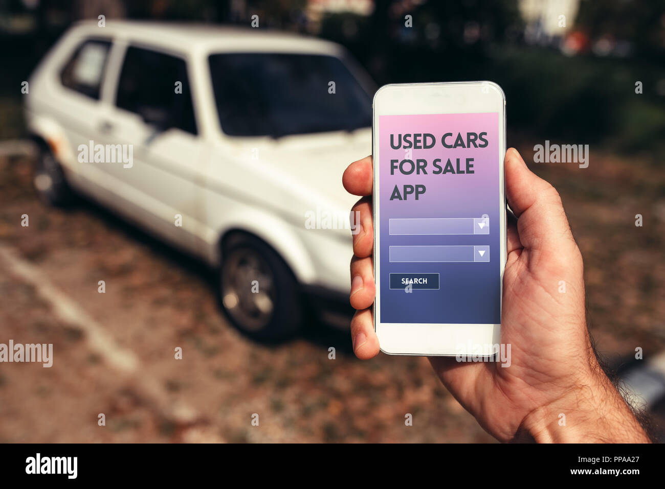 Used cars smartphone app mock up, vehicle dealer holding mobile phone ...