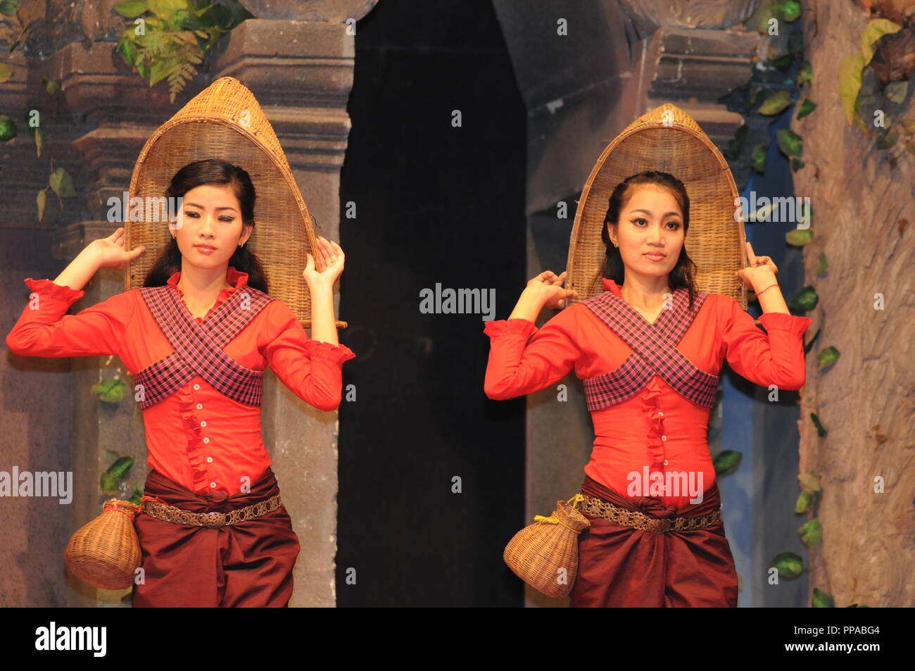 Khmer women in kramas performing the fishing dance, Siem Reap, Cambodia ...