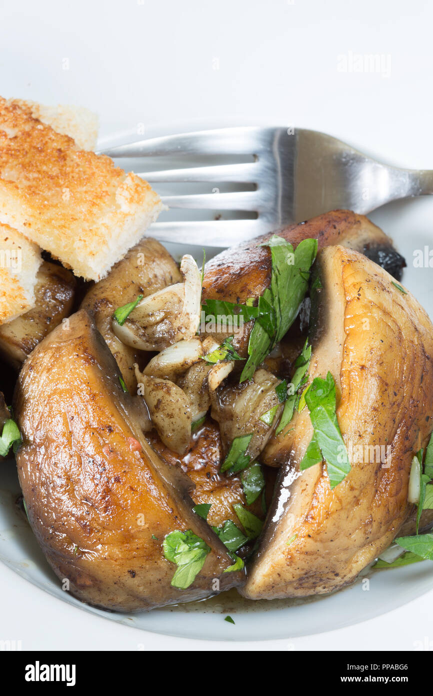 An English pub/restaurant Entree dish of fried Garlic Mushrooms with ...