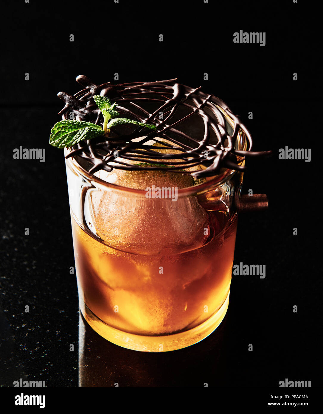 mixologists shooting bullet Delicious tempting Cocktail on dark ...