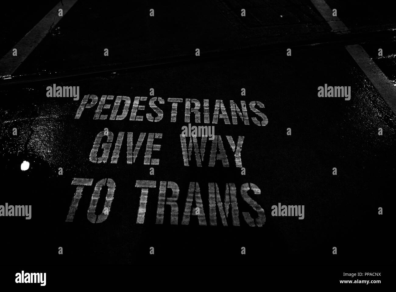 Give way to trams sign Black and White Stock Photos & Images - Alamy