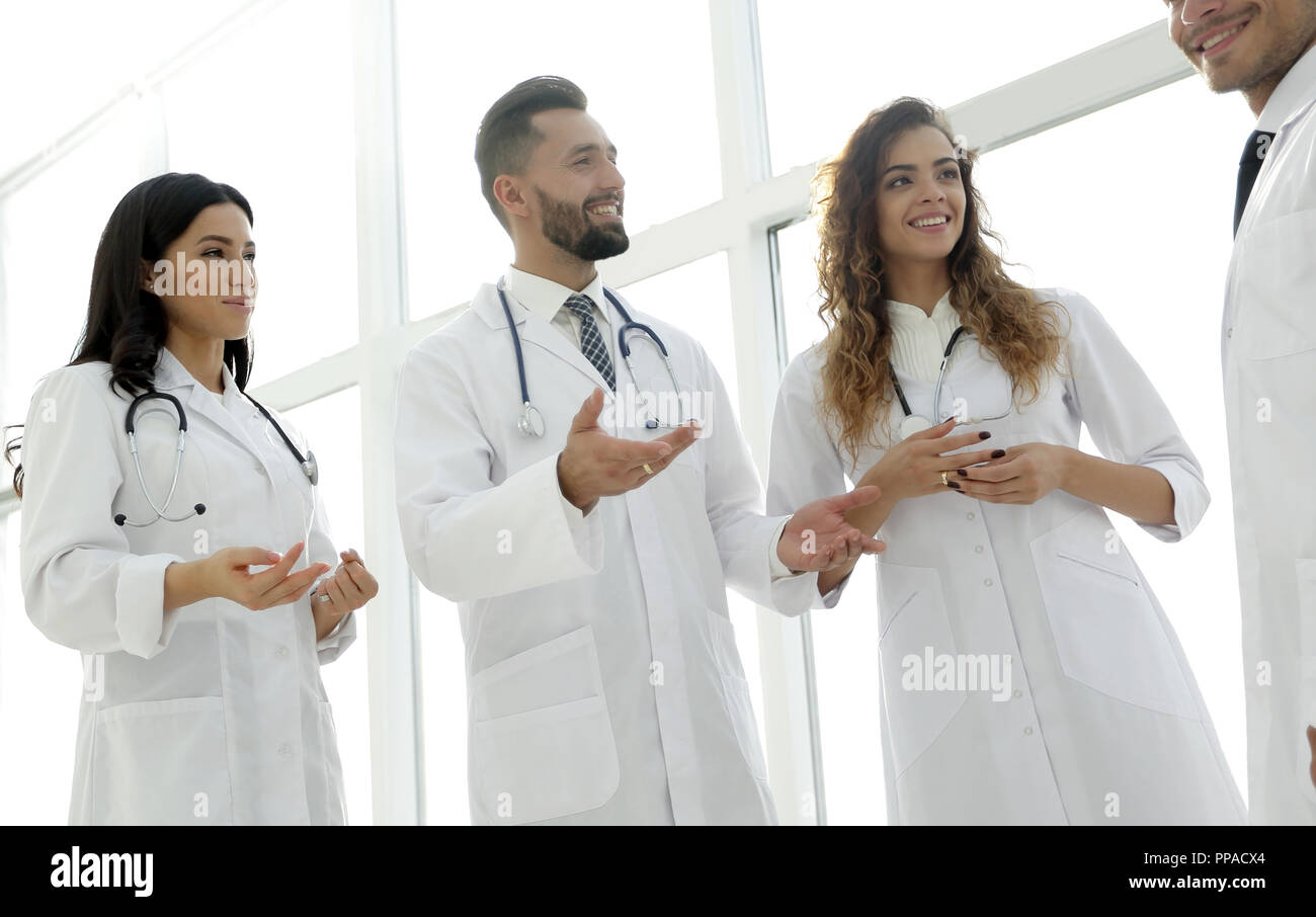 closeup of a group of doctors discussing Stock Photo - Alamy