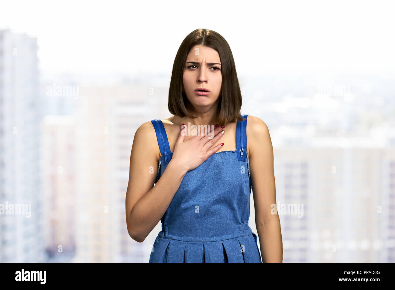 Beautiful brunette woman suffering from cough. Pretty girl coughing and ...