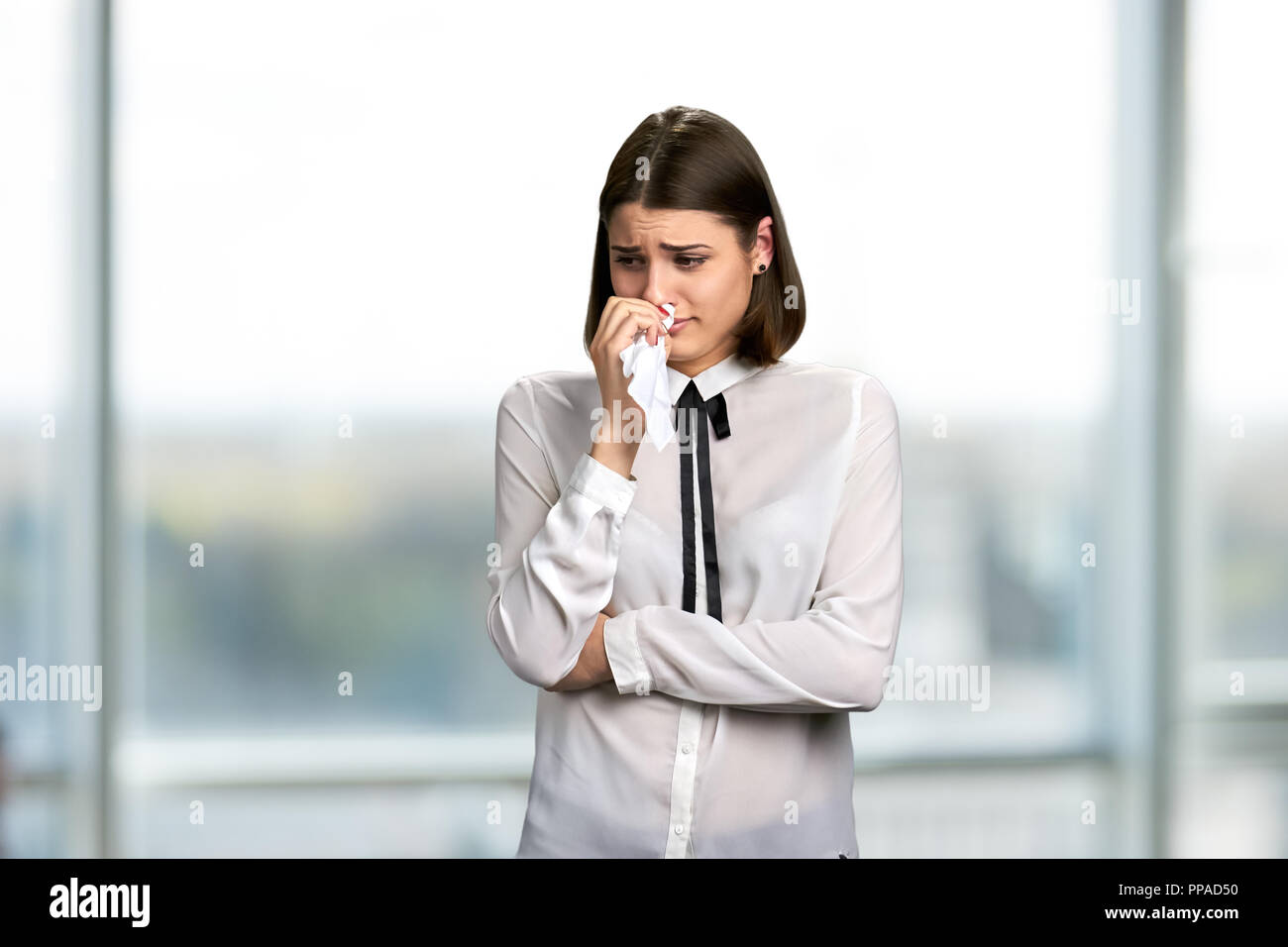 Woman crying at work hi-res stock photography and images - Alamy