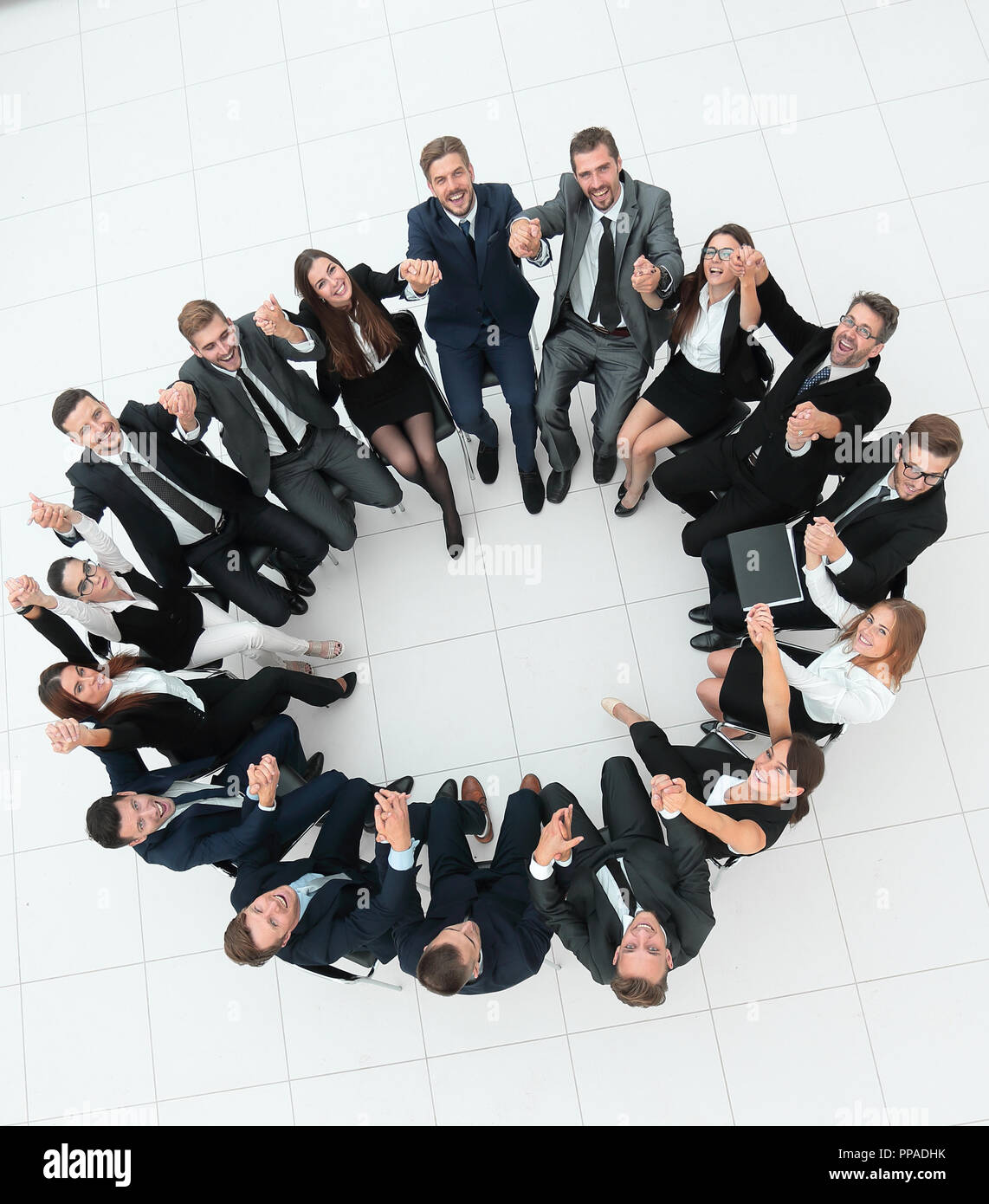 concept of team building .large successful business team sitting in a ...