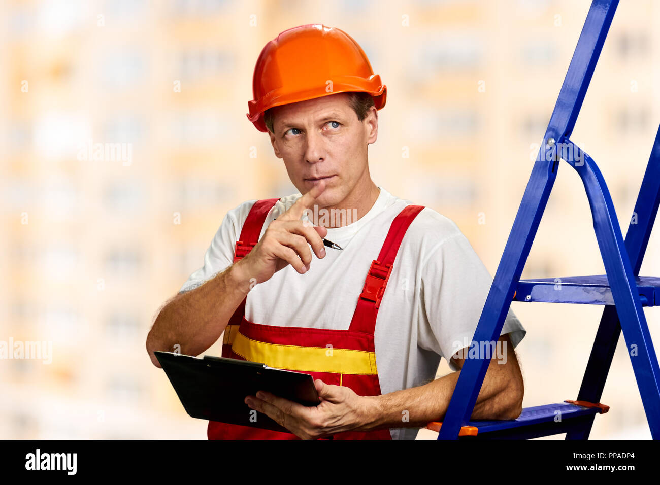 Caucasian foreman checking the object Stock Photo - Alamy Caucasian foreman checking the object Stock Photo - Alamy