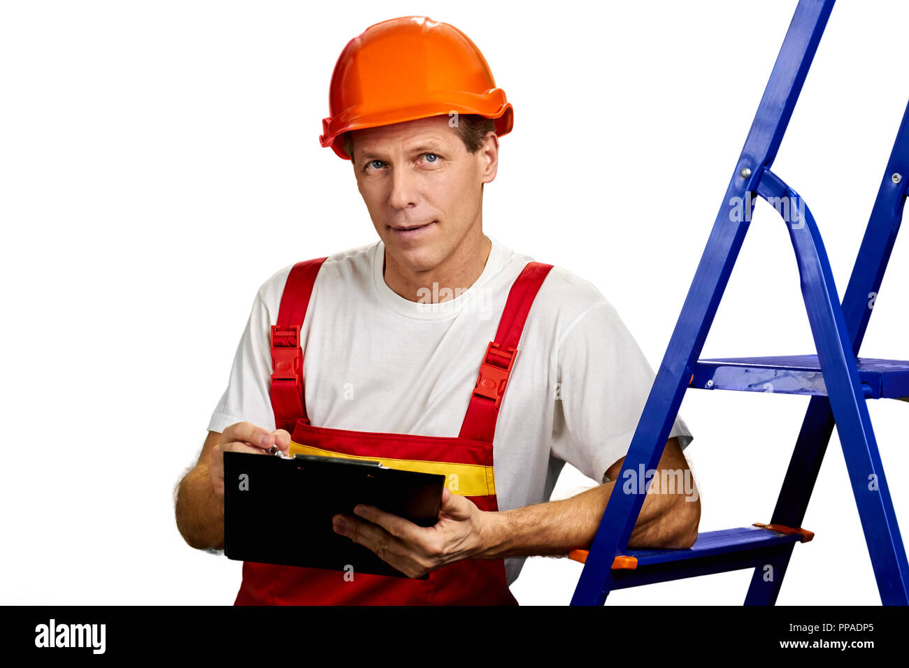 Successful worker examining new object Stock Photo - Alamy