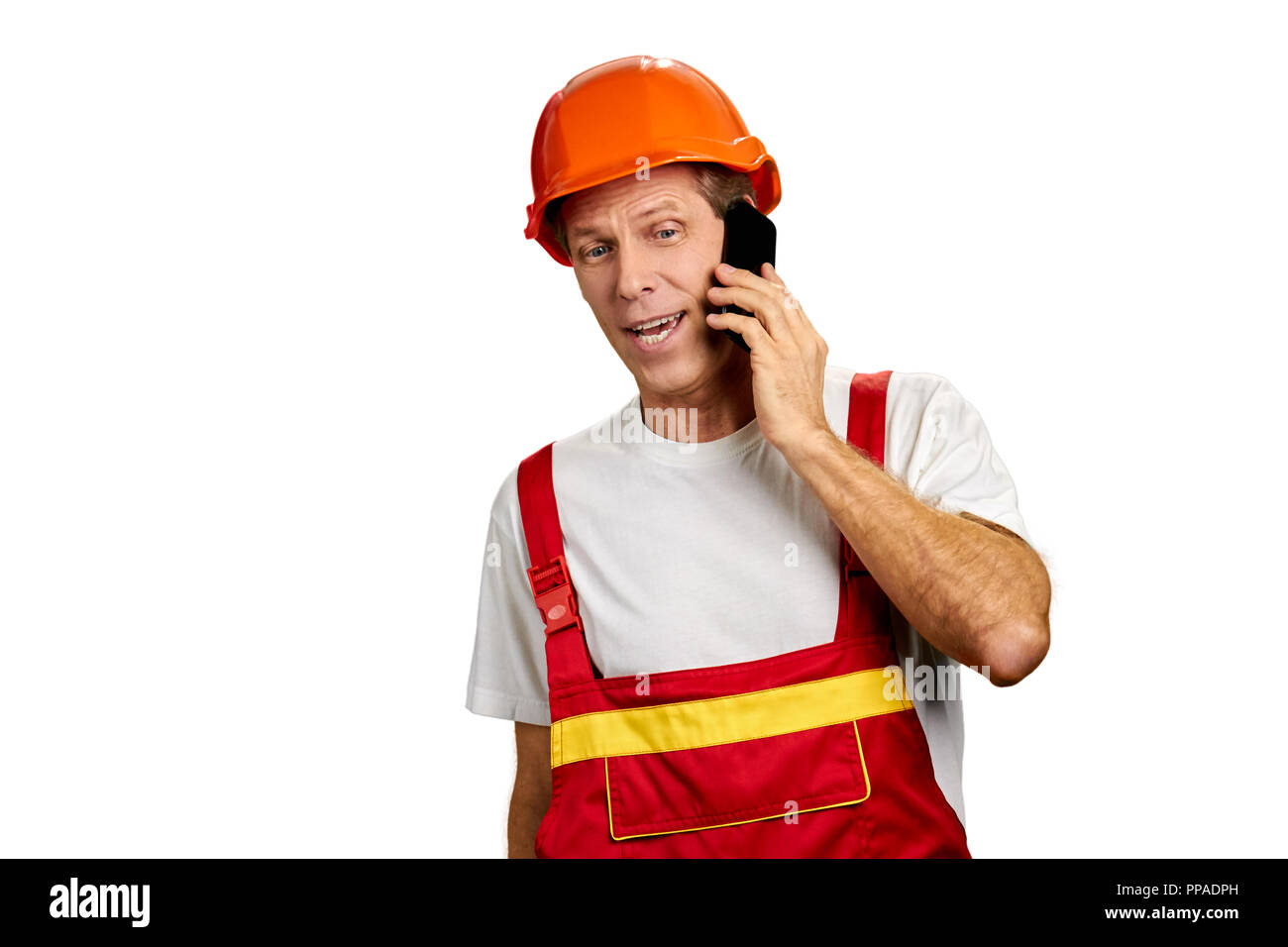 Construction contractor talking on cellphone hi-res stock photography ...