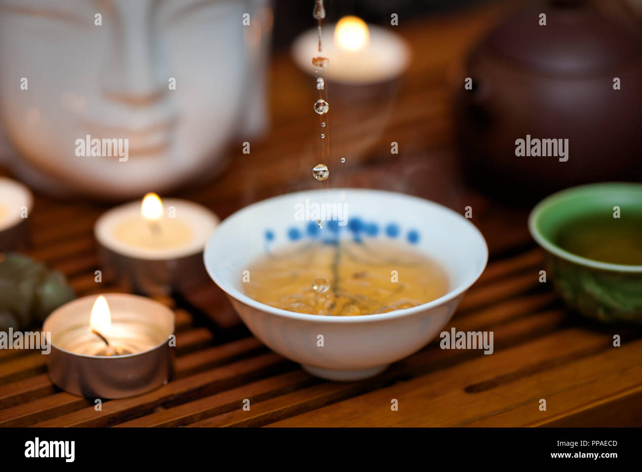 Chinese tea ceremony with candles. Close up photo Stock Photo - Alamy
