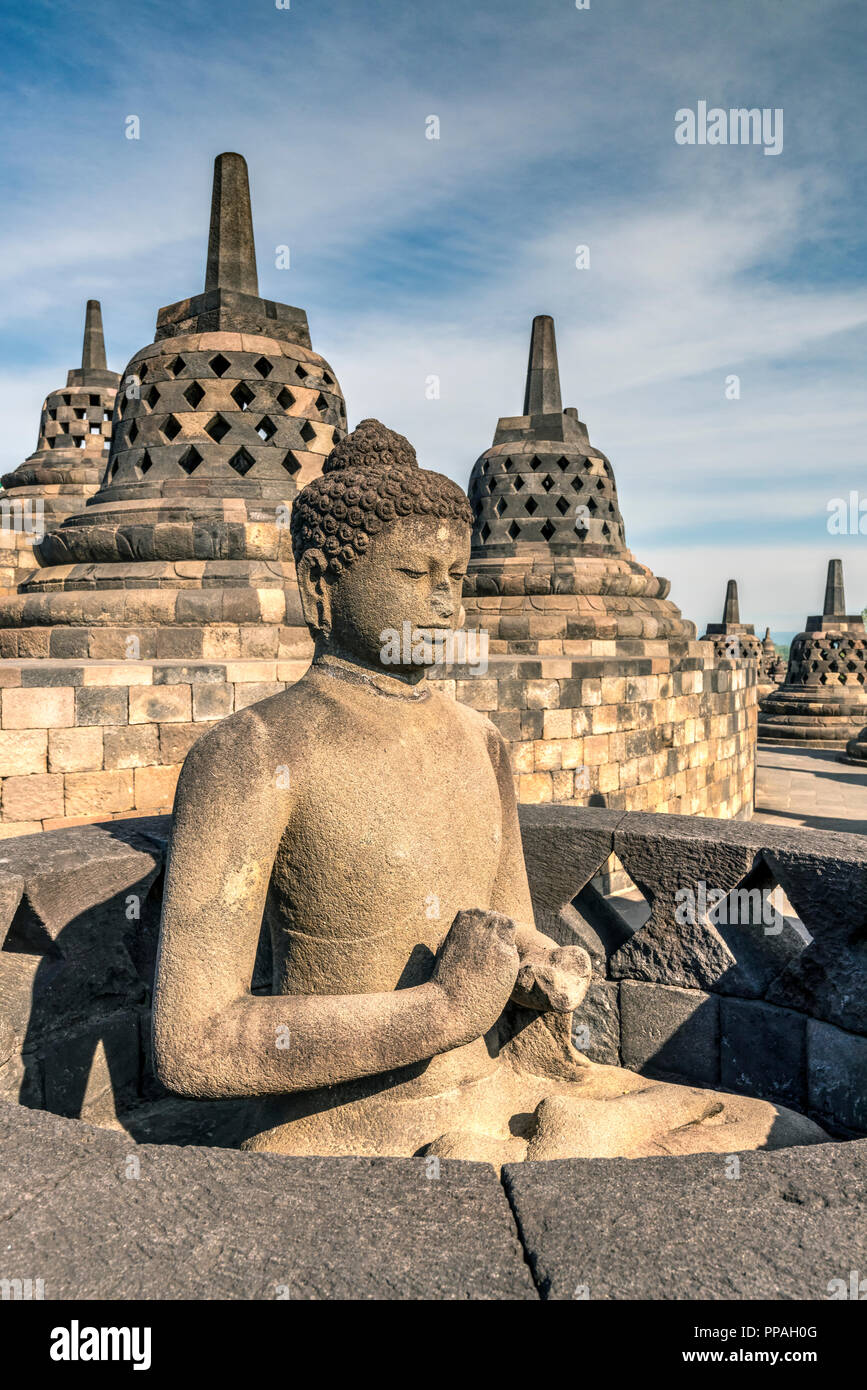 Buddha statue, Candi Borobudur buddhist temple, Muntilan, Java ...