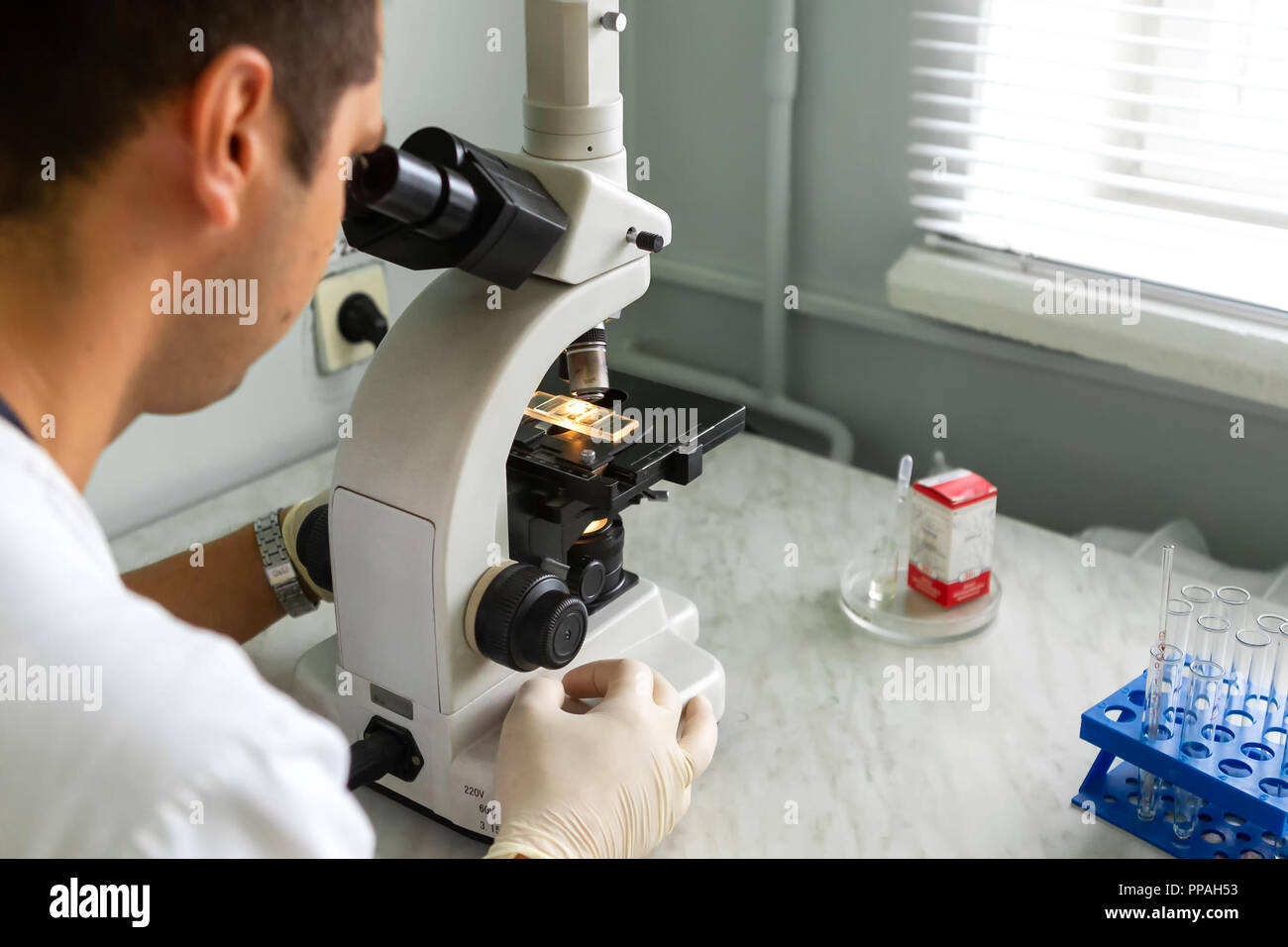 Old microscope. Real medical equipment for blood analysis Stock Photo ...