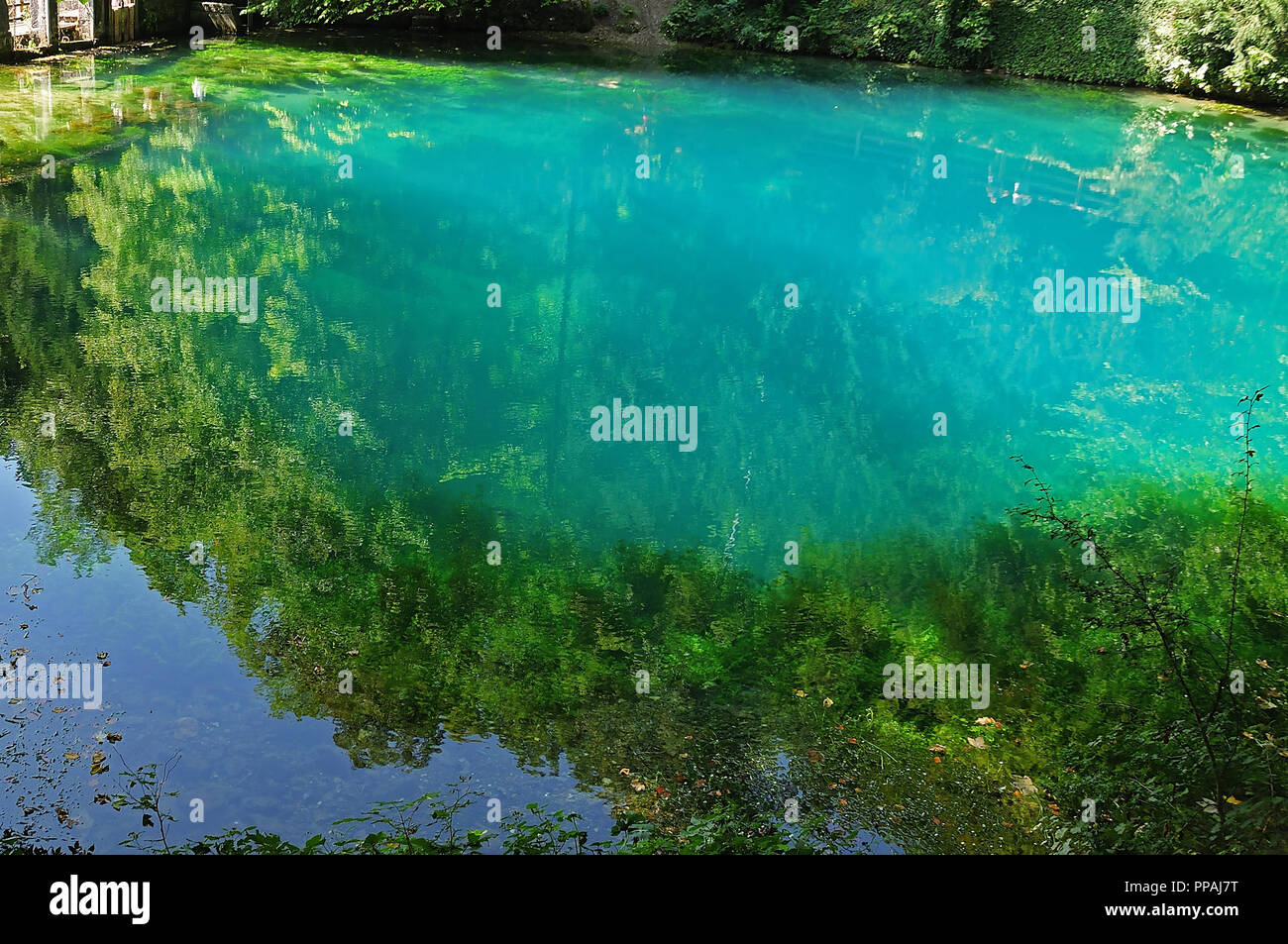 Blautopf, karstic spring, source of river Blau in Blaubeuren, Germany ...