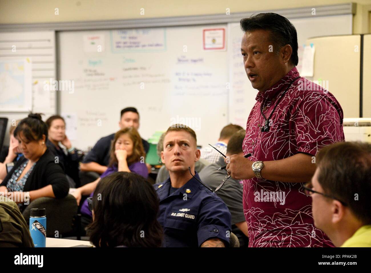 Emergency Operations Center Director Herman Andaya briefs emergency ...