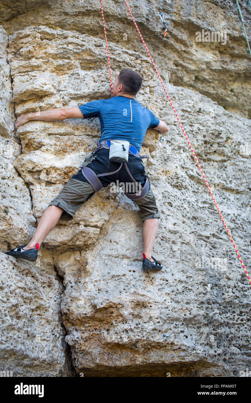 Vertical Photo Tourist Rock Climbing High Resolution Stock Photography ...