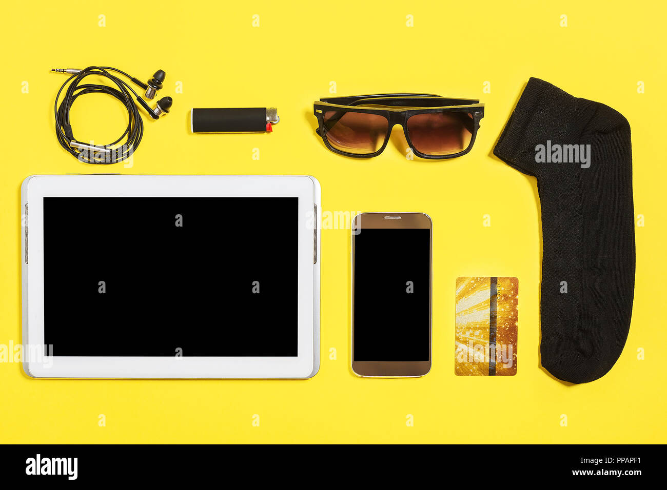 collection of modern people accessories on a yellow background Stock ...