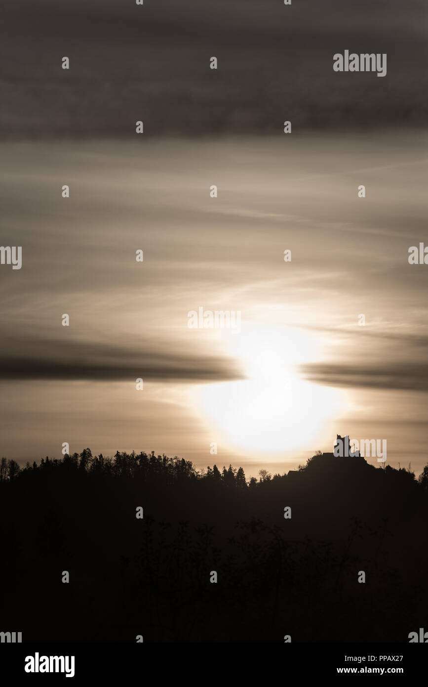 Old castle ruins of Grad Smlednik near Vodice silhouetted against a ...