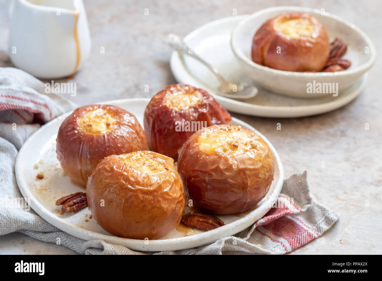Baked apples with cottage cheese Stock Photo - Alamy