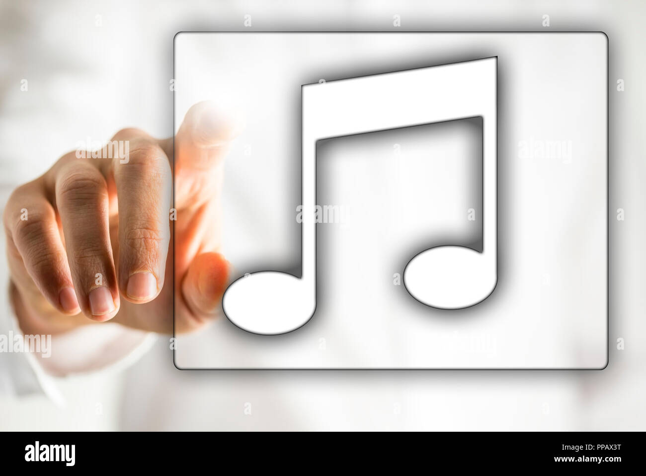 Musical notes icon on virtual screen Stock Photo - Alamy