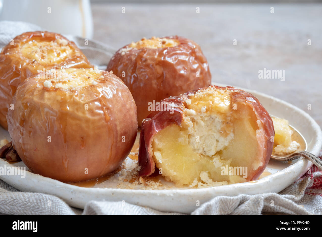 Baked apples with cottage cheese Stock Photo - Alamy