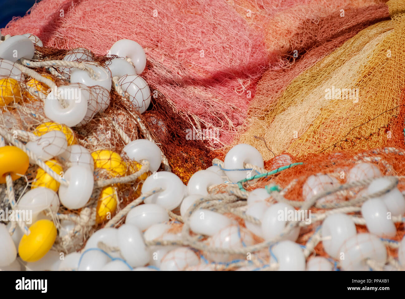 background of colorful fishing nets and floats Stock Photo - Alamy