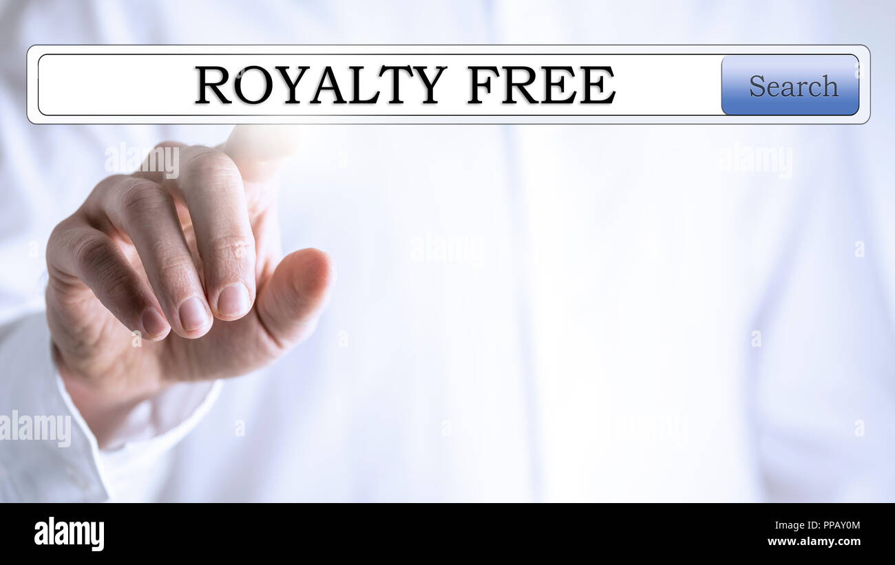 Close-up of a hand pressing with the finger on the words 'royalty free ...