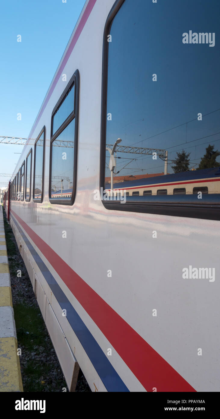 Train waiting passengers at railway station Stock Photo - Alamy