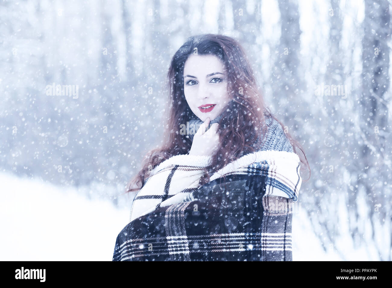 Beautiful girl in a beautiful winter snow Stock Photo - Alamy