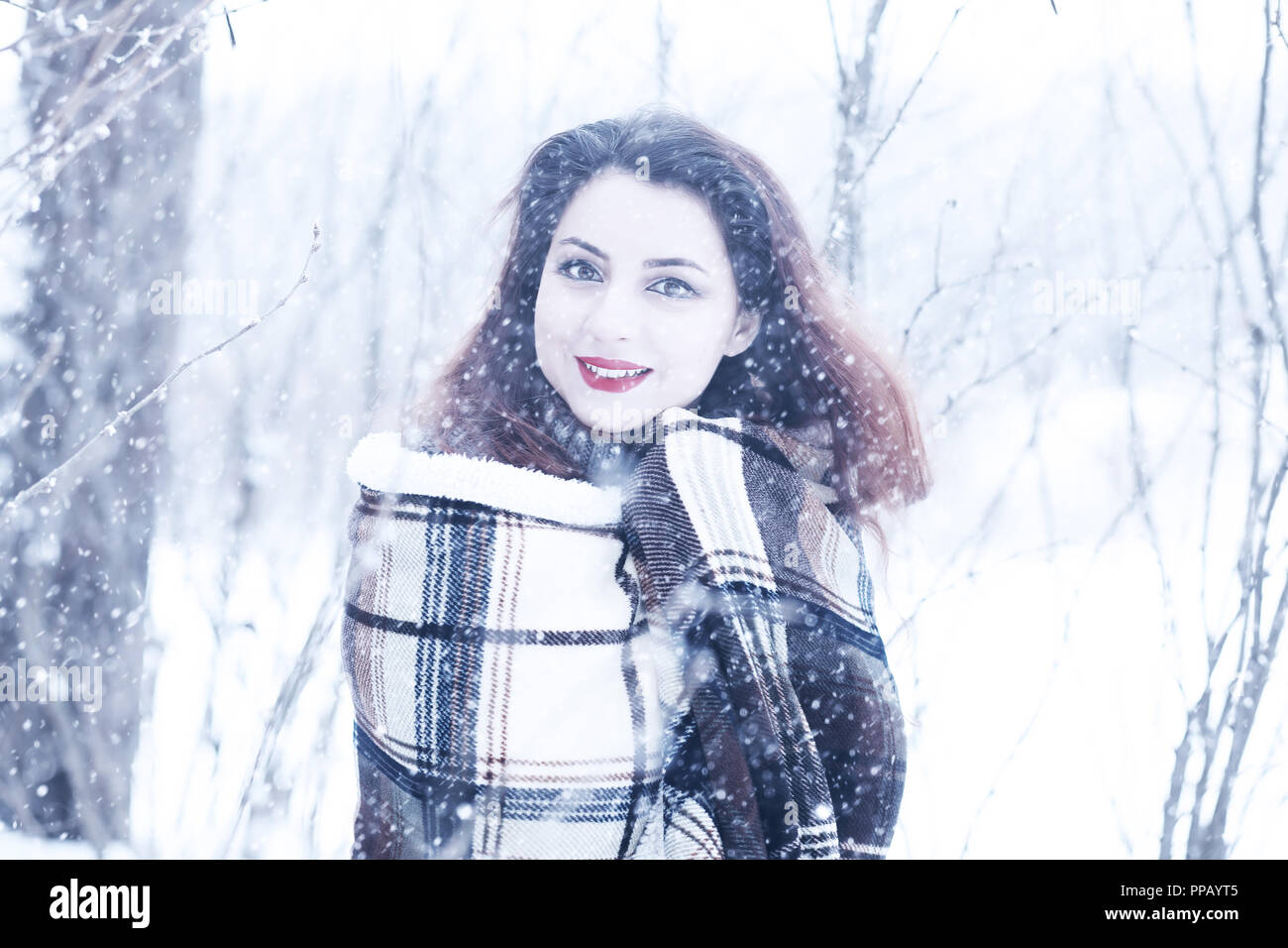 Beautiful girl in a beautiful winter snow Stock Photo - Alamy