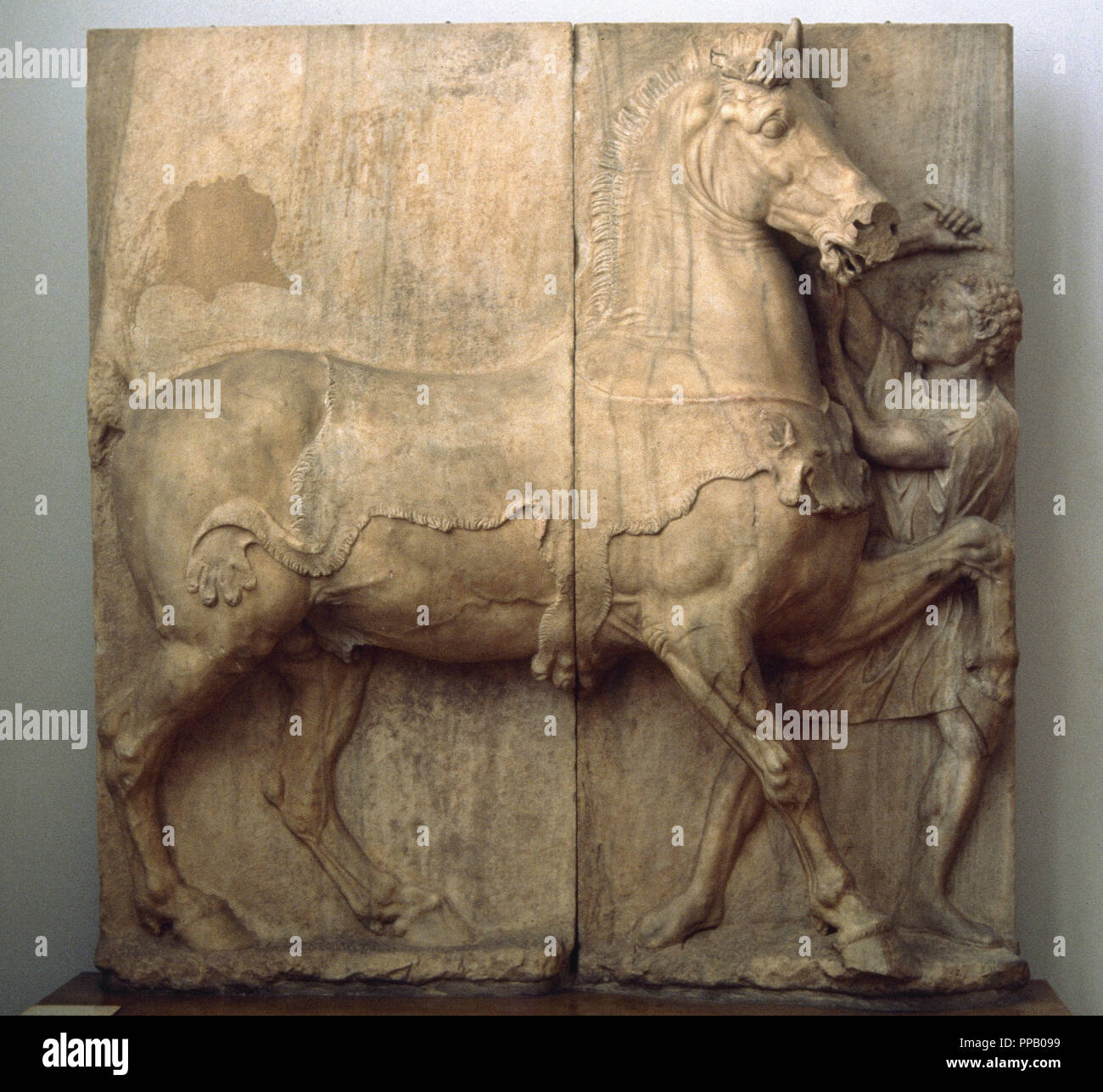 Funerary relief depicting a ethiopian slave trying to control a horse ...