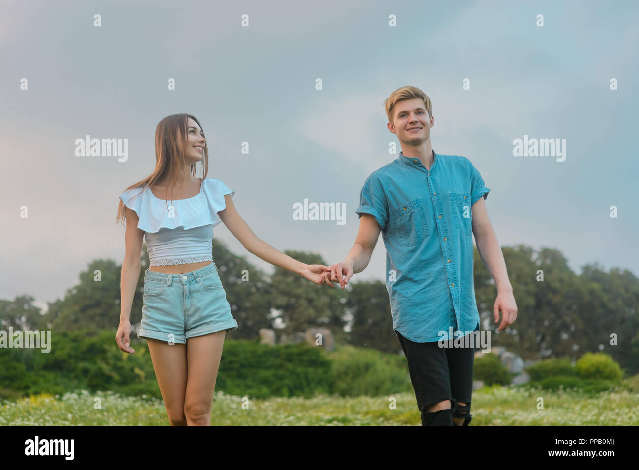 Cute portrait of a young pair Stock Photo - Alamy