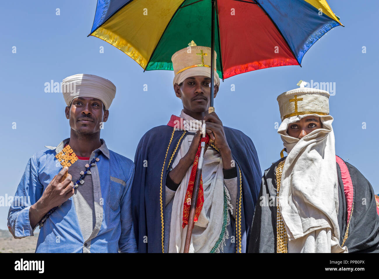 Local religious wedding procession of groom taking wife from her house ...