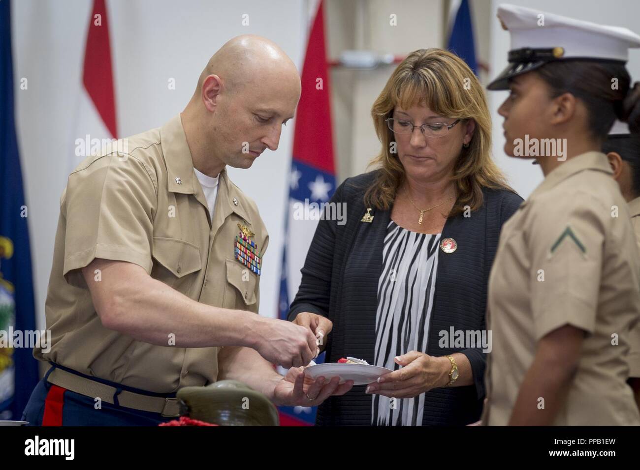 U.S. Marine Corps Lt. Col. Louis P Simon, left, executive officer ...