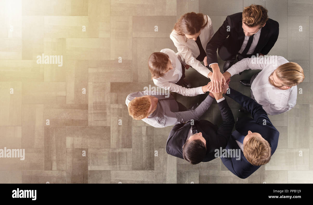 Business people putting their hands together. Concept of integration ...
